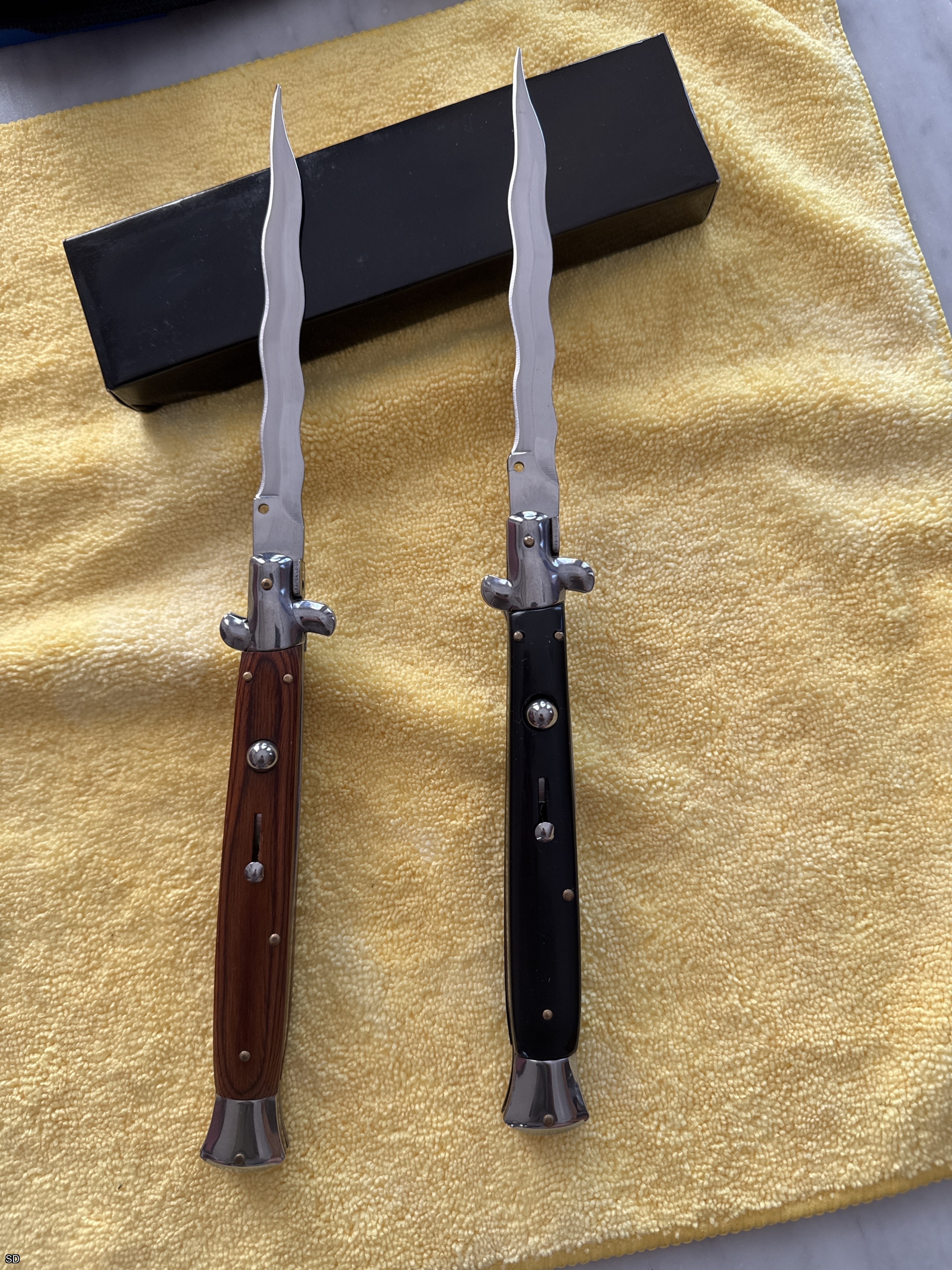 Two Kris Blade knives one money